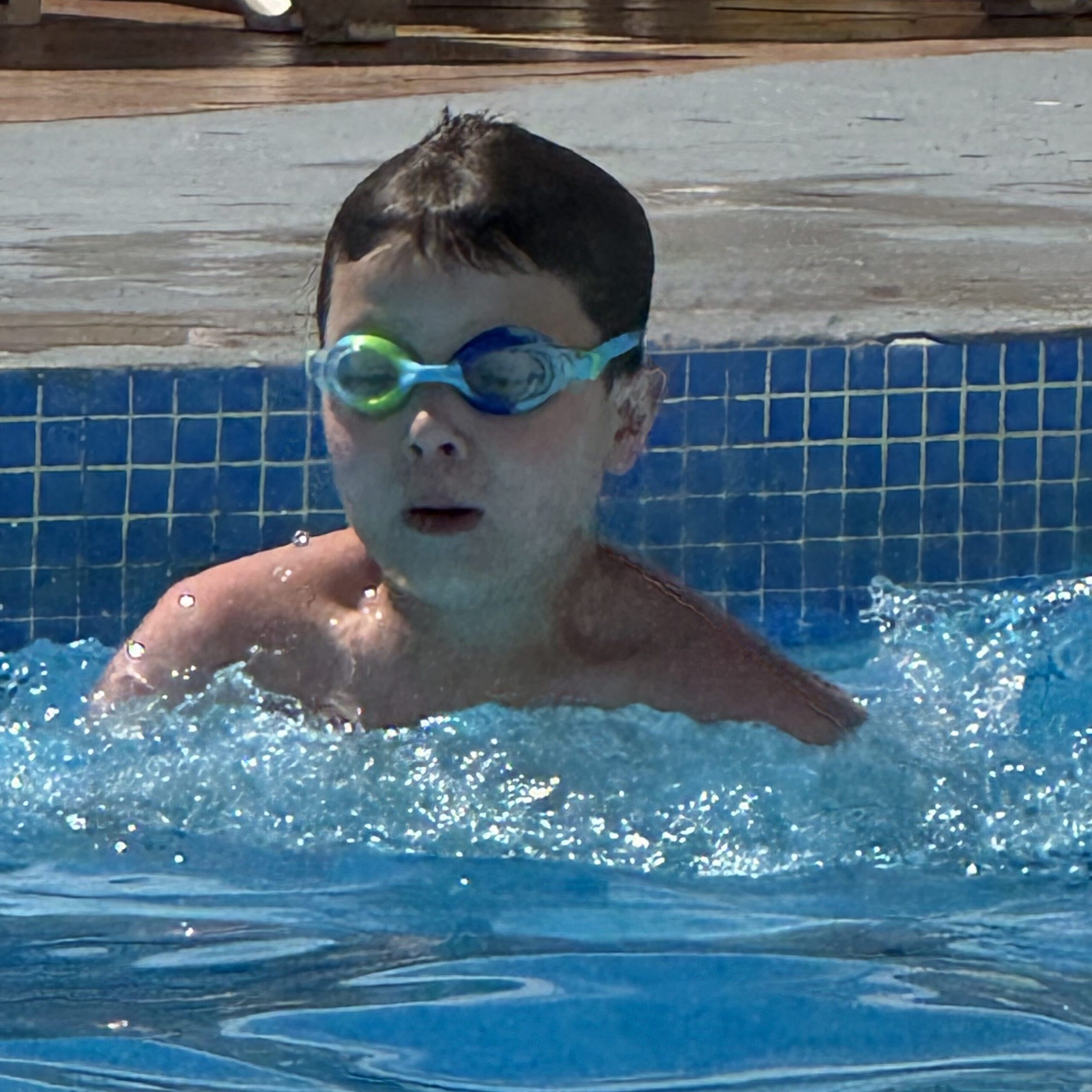 Young boy takes on two-mile swimathon for charity